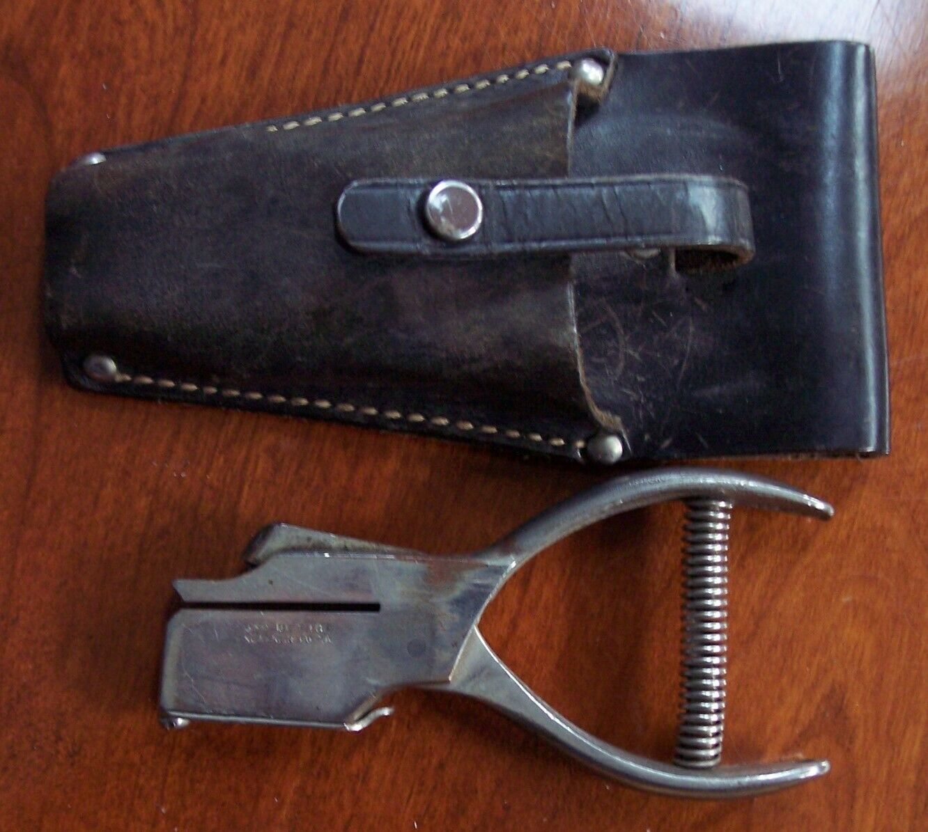 VINTAGE RAILROAD CONDUCTOR ' S TICKET PUNCH WITH LEATHER HOLDER ...